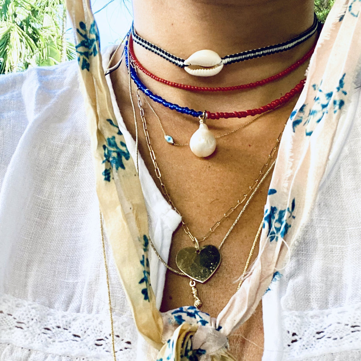Cowrie shell choker store